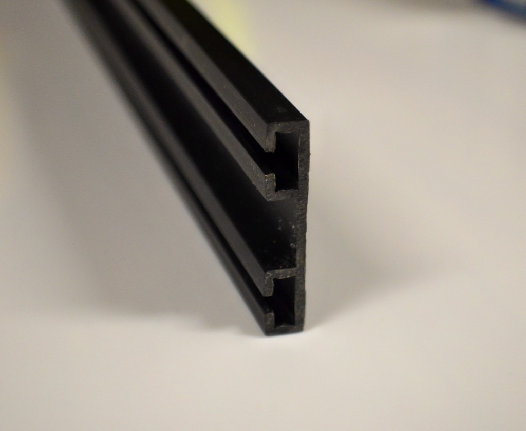 GARAGE DOOR BOTTOM RETAINER